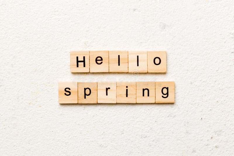 Hello Spring Word Written on Wood Block. Hello Spring Text on Cement ...