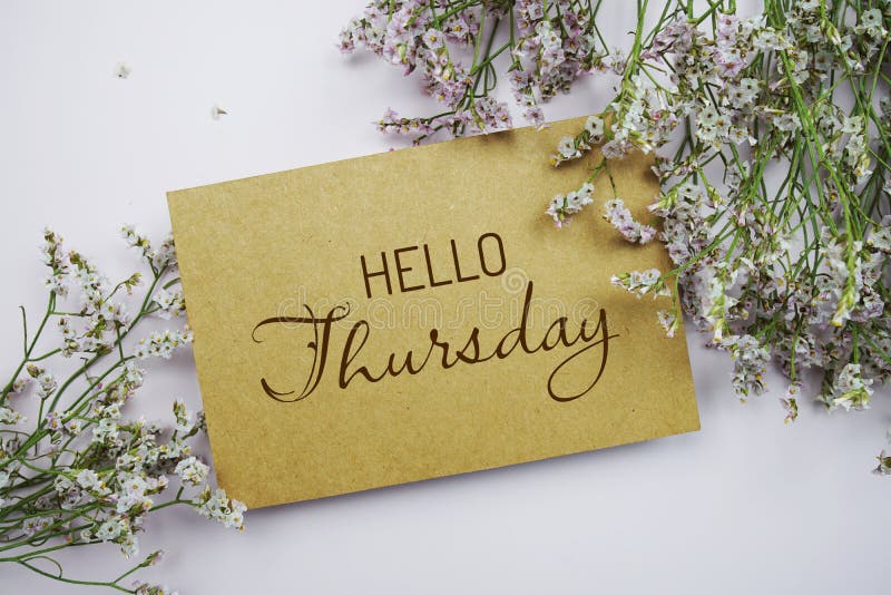 Hello Thursday Written on Paper Card with Flower Frame Decoraton on ...