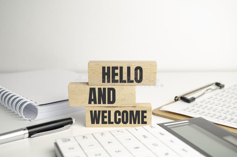 Hello and Welcome Symbol. Concept Words Hello and Welcome on Wooden ...