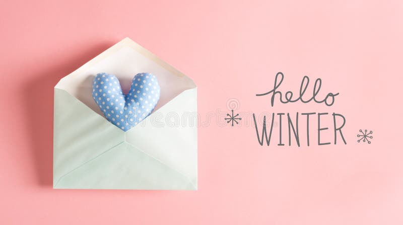 Hello Winter Message with a Blue Heart Cushion Stock Photo - Image of ...