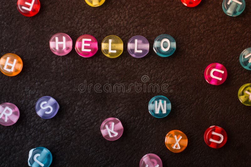 Hello Wording with Multi Color Alphabet Letter Beads Stock Photo ...