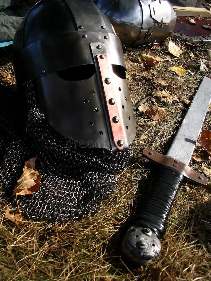 Helm and sword stock photo. Image of battle, fighting, helmet - 985308