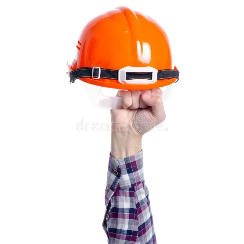 Helmet hard hat in hand stock image. Image of closeup - 143965933