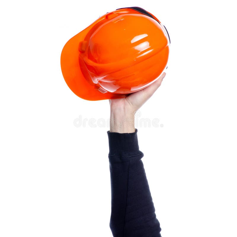 Helmet hard hat in hand stock image. Image of industrial - 143921571