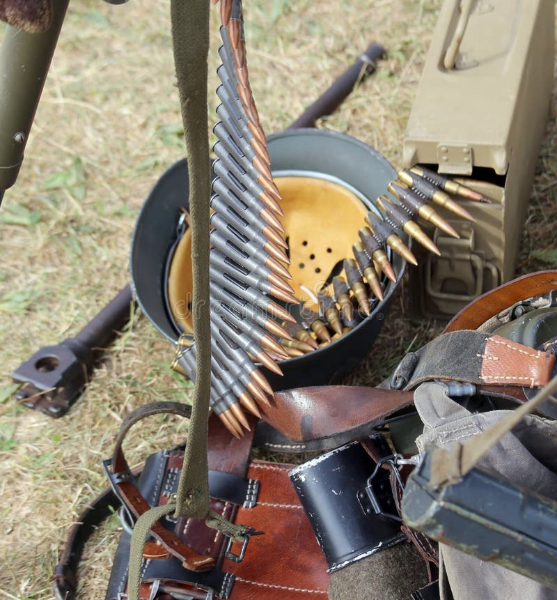 Helmet of Soldier Uniform with a Rifle in the Army Camp Stock Photo ...