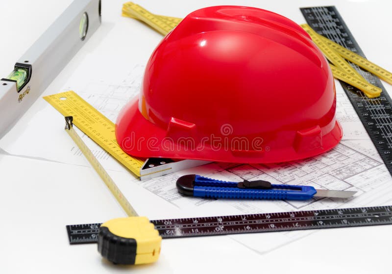 Helmet and Tools for Construction Drawings and Buildings Stock Photo ...