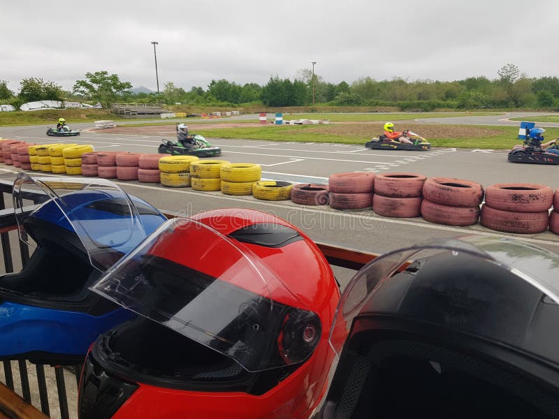 Helmets Against Go-karting Track Background Stock Image - Image of ...