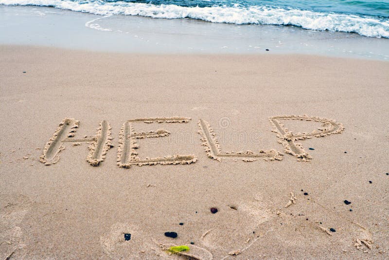 Help Written Sand Stock Images - Download 204 Royalty Free Photos
