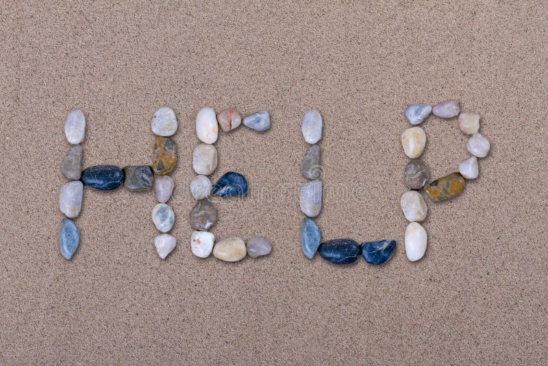 Help Written Sand Stock Images - Download 204 Royalty Free Photos