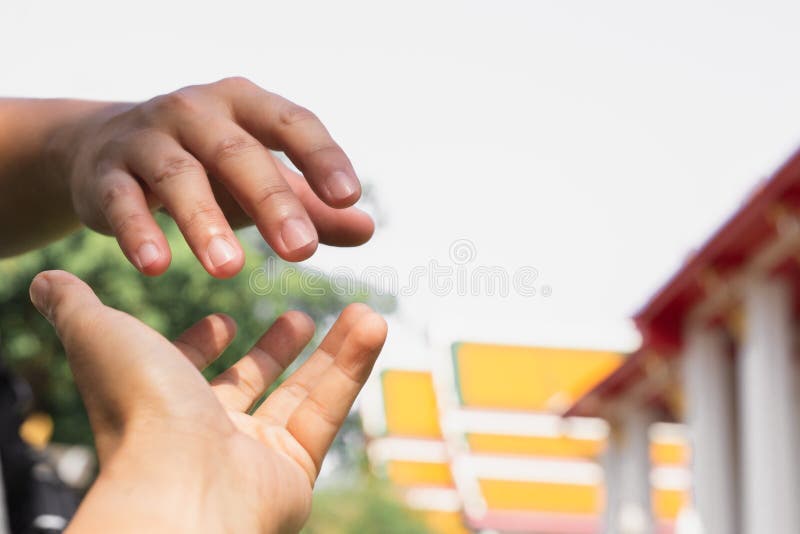 Help Concept Hands Reaching Out To Help Each Other. Stock Image - Image ...