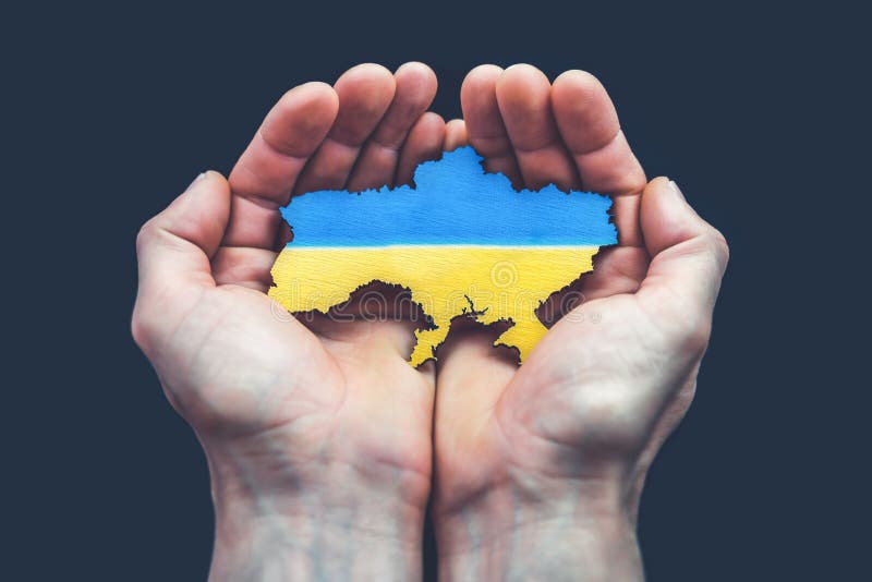 Help Concept. Male Hands Hold Map of Ukraine on Black Background Stock ...