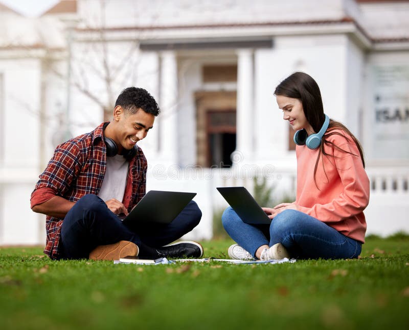 We always Help Each Other Out. Two Students Using Their Laptops while ...