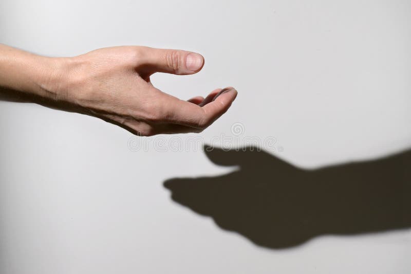 Help with Hand and Other Hand Shadow Stock Image - Image of giving ...