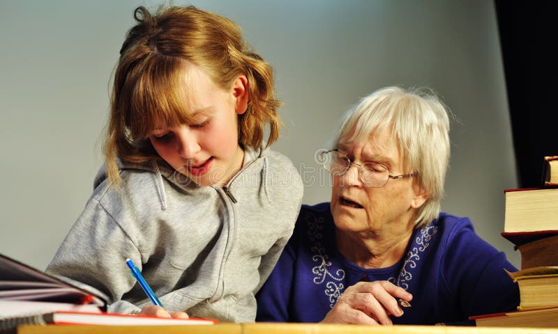 Help with Homework stock image. Image of grandmother - 24827887