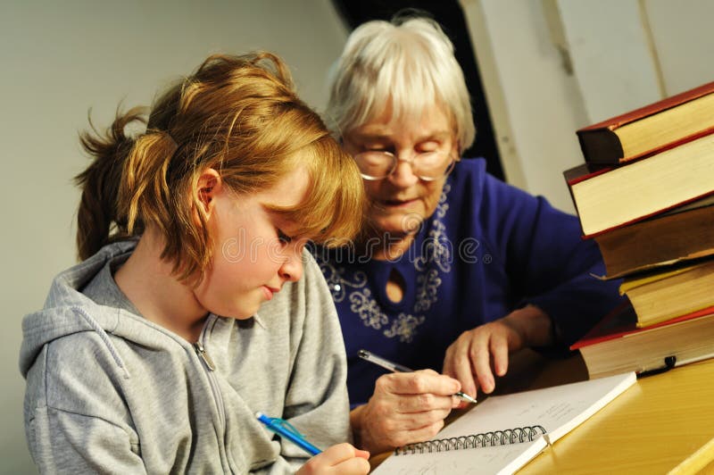 Help with Homework stock image. Image of explaining, grandmother - 24827951