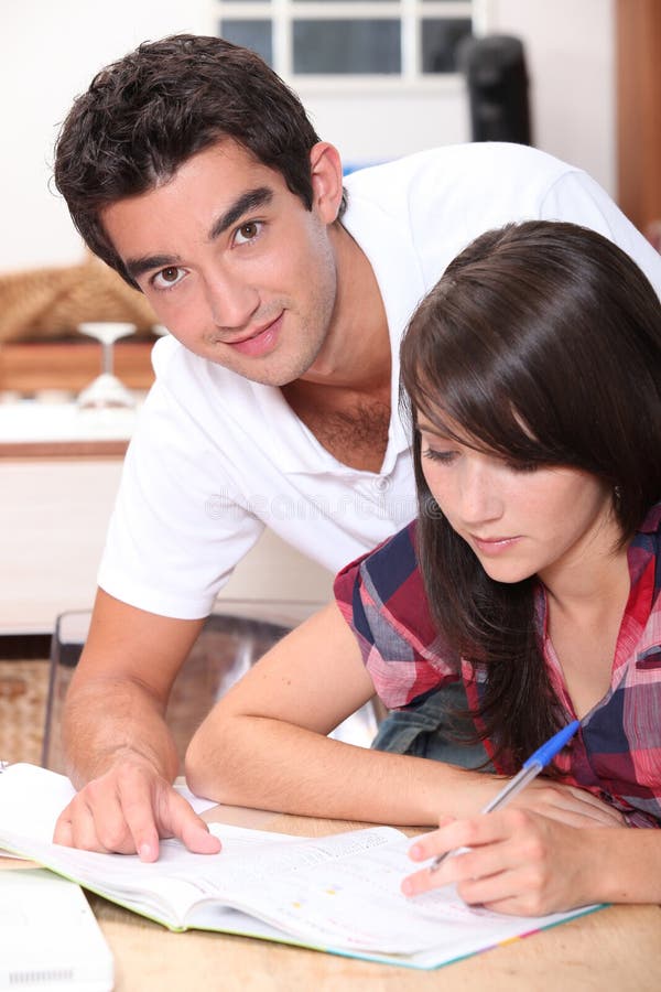 Help with homework stock image. Image of adolescence - 26940607