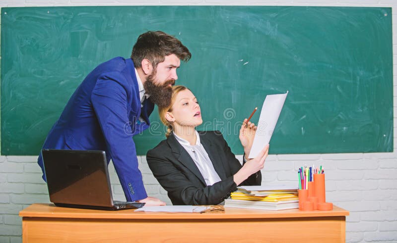 Help Me with Documents. Teacher and Supervisor Working Together in ...