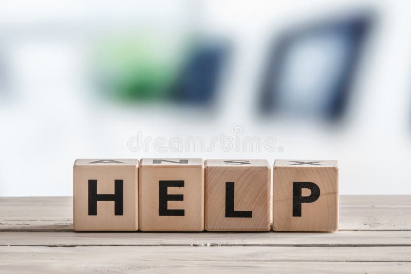 Help Sign on a Wooden Table Stock Image - Image of color, answer: 67629427