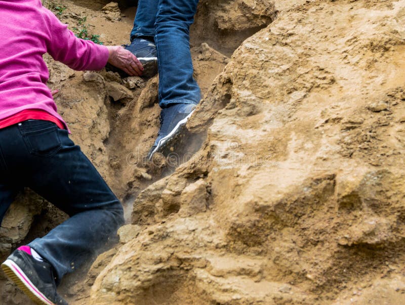 Help for Sliding on a Slope Man Stock Image - Image of dust, death ...