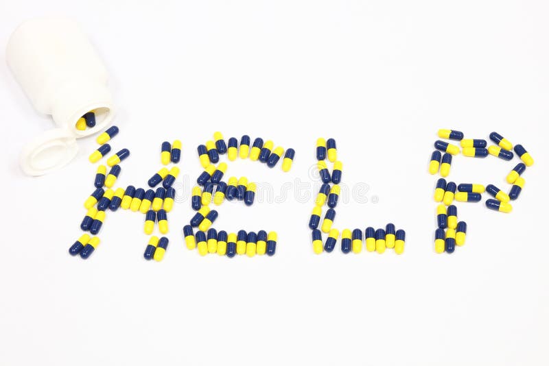 HELP Text Written with Capsules on White Paper Stock Image - Image of ...