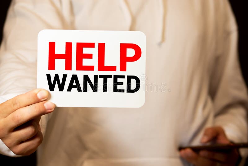 Help Wanted Post it in Business Man Hand Stock Photo - Image of wanted ...