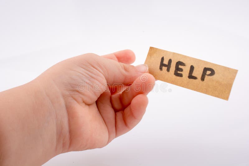 Help word on a piece paper stock photo. Image of support - 80178436
