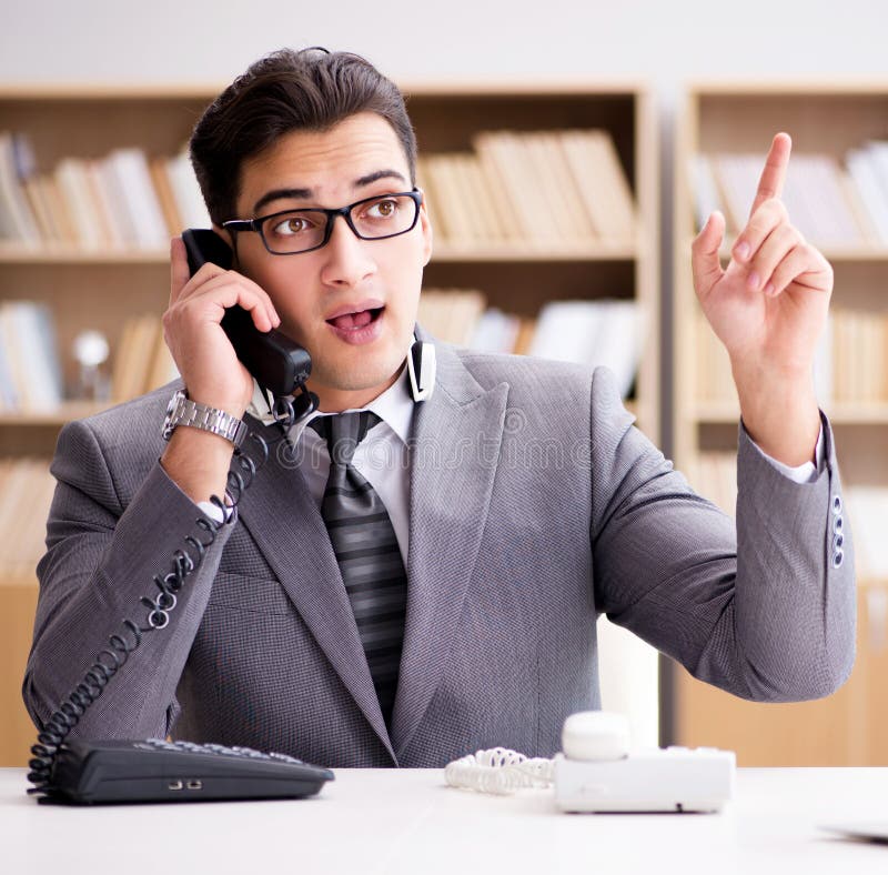 Helpdesk Operator Talking on Phone in Office Stock Image - Image of ...