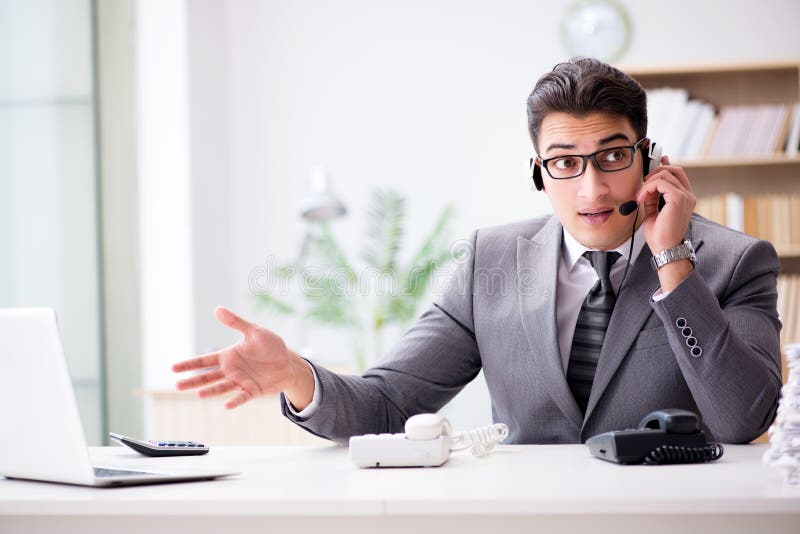 The Helpdesk Operator Talking on Phone in Office Stock Image - Image of ...