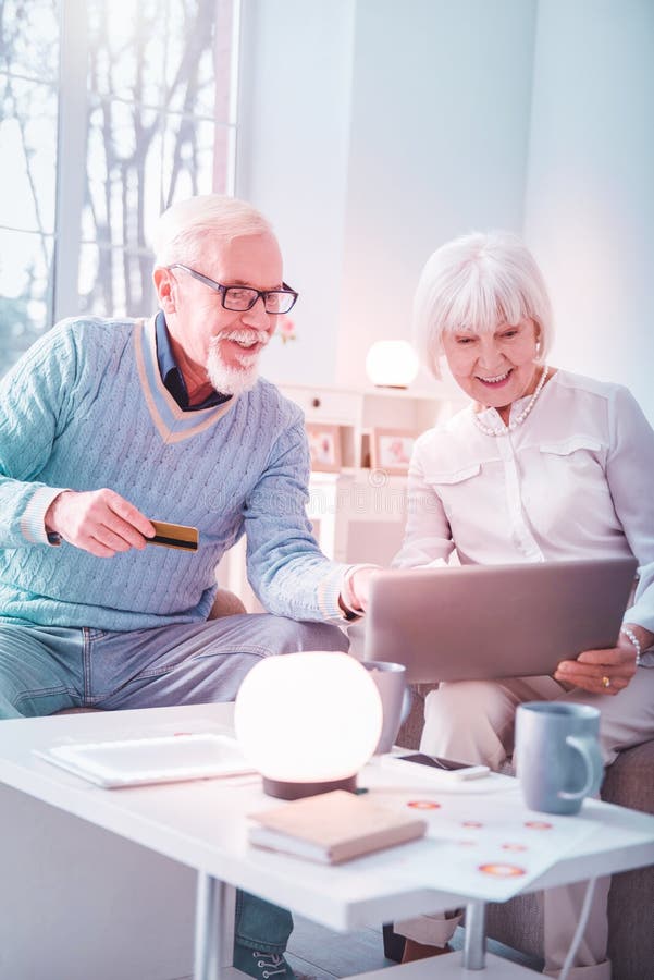 Helpful Elderly Husband Teaching His Wife Using Internet and Buying ...
