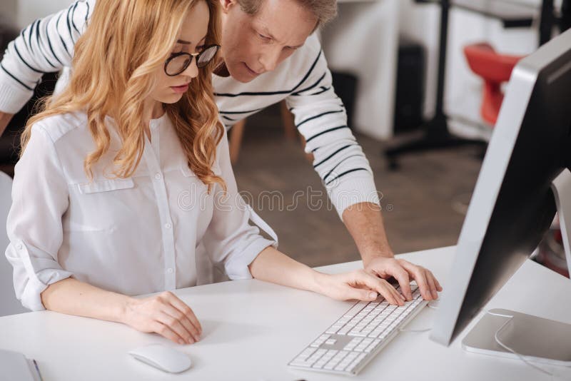 Helpful Office Managers Working Together at the Workplace Stock Image ...