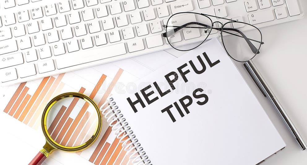 HELPFUL TIPS Text Written on Notebook with Keyboard, Chart,and Glasses ...
