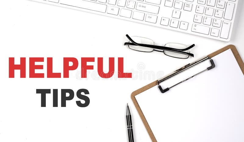 HELPFUL TIPS Text Written on White Background with Keyboard, Paper ... HELPFUL TIPS Text Written on White Background with Keyboard, Paper ...