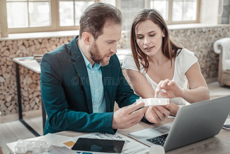 Helpful Wife Assisting Her Husband Working on New Project Stock Image ...