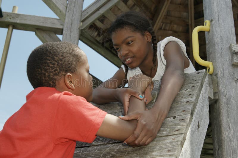 Helping each other stock photo. Image of pull, girl, black - 24763318