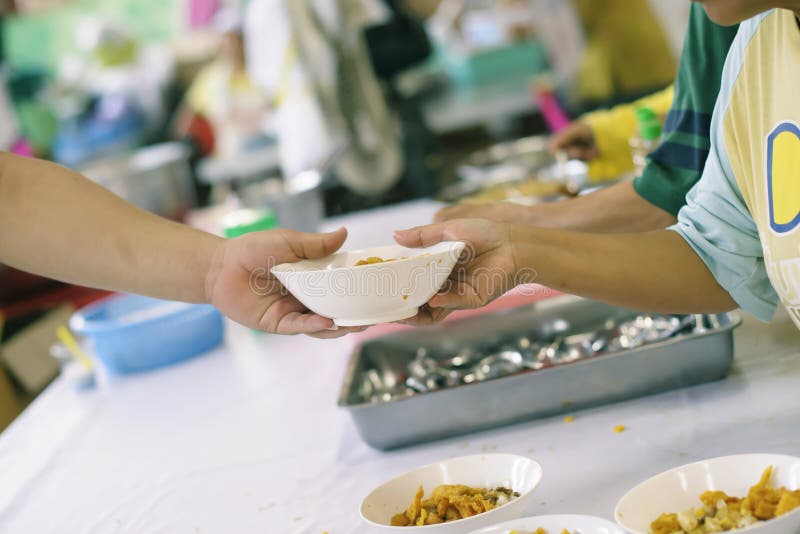 Helping Feed the Poor : the Concept of Hunger Stock Photo - Image of ...