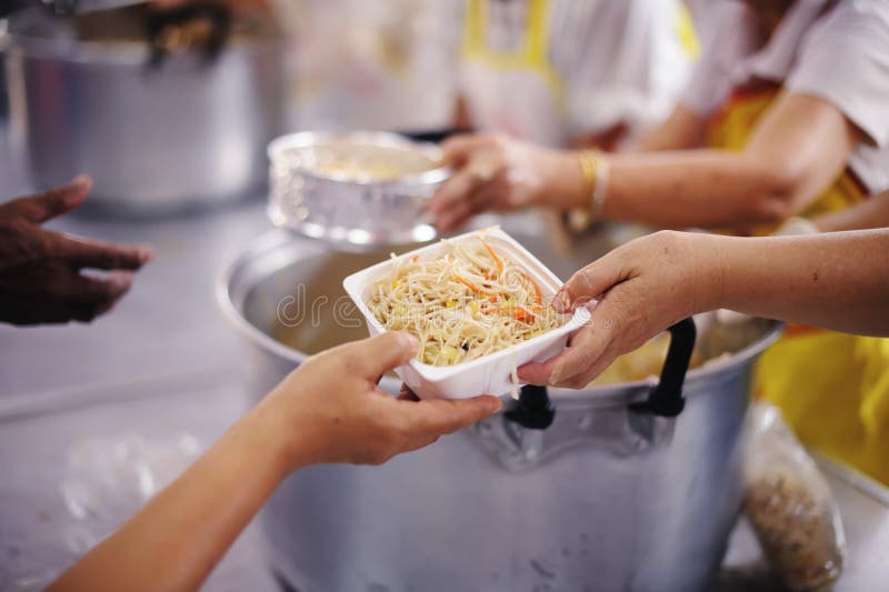 Helping Feed the Poor : the Concept of Hunger Stock Photo - Image of ...