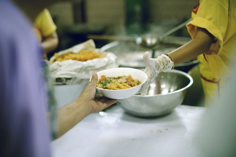 Helping Feed the Poor : the Concept of Hunger Stock Image - Image of ...