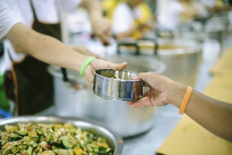 Helping Feed the Poor : the Concept of Hunger Stock Photo - Image of ...