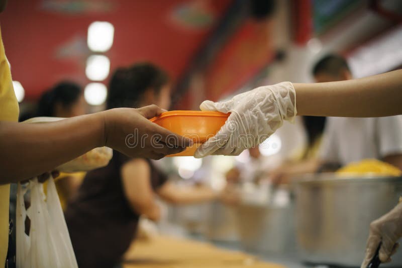 Helping Feed the Poor : the Concept of Hunger Stock Image - Image of ...