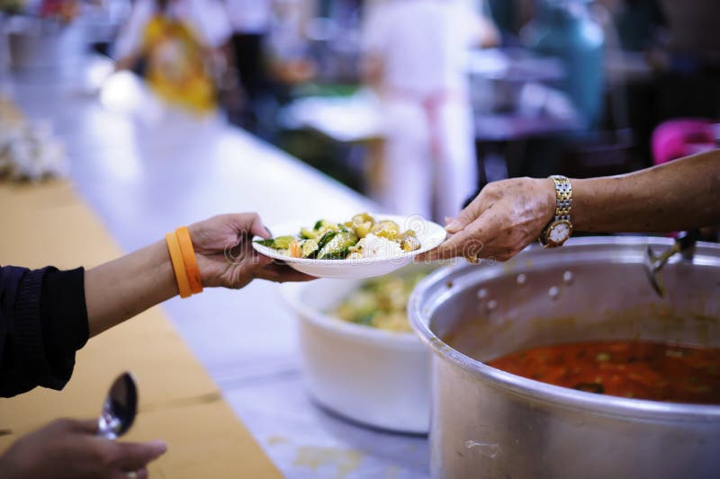 Helping Feed the Poor : the Concept of Hunger Stock Photo - Image of ...