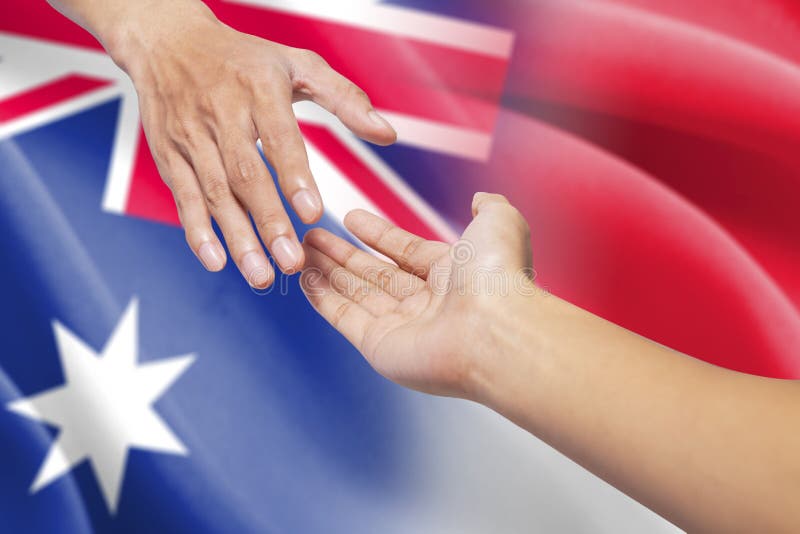 Helping Hands with Australian and Indonesian Flags Stock Photo - Image ...