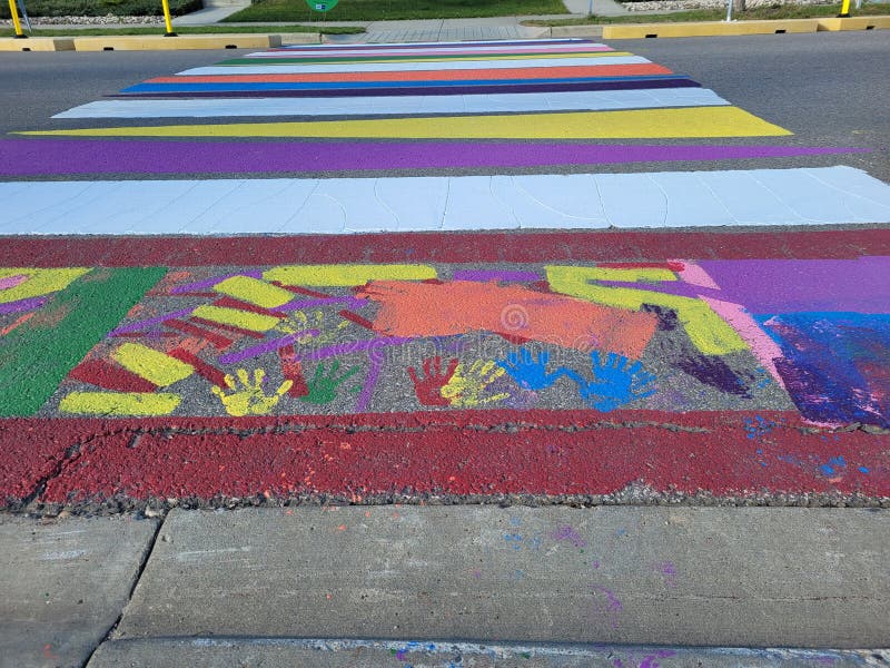 Helping Hands Painted Crosswalk Stock Image - Image of graffiti, pink ...