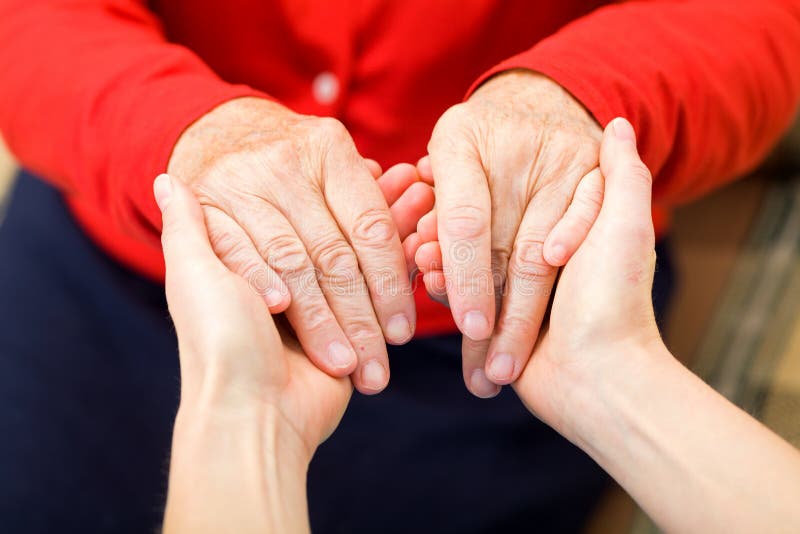 Close Up Hands of Helping Hands for Elderly Home Care. Stock Image ...