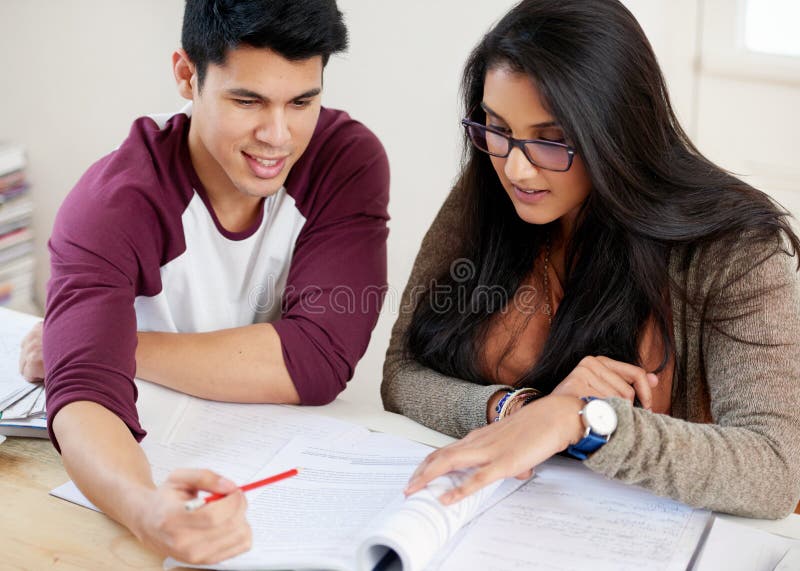 Helping Her Prep for the Exams. Two University Students Studying. Stock ...