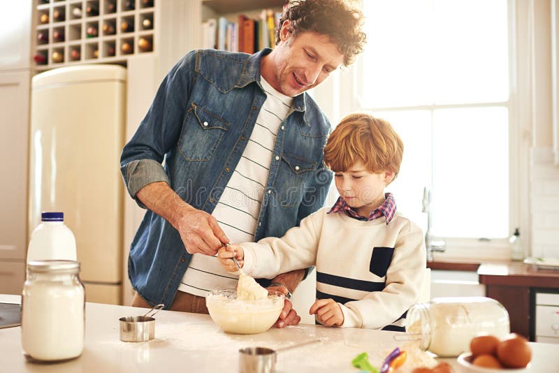 Helping His Little Baker Out. a Father and Son Baking Together at Home. Stock Photo - Image of ...