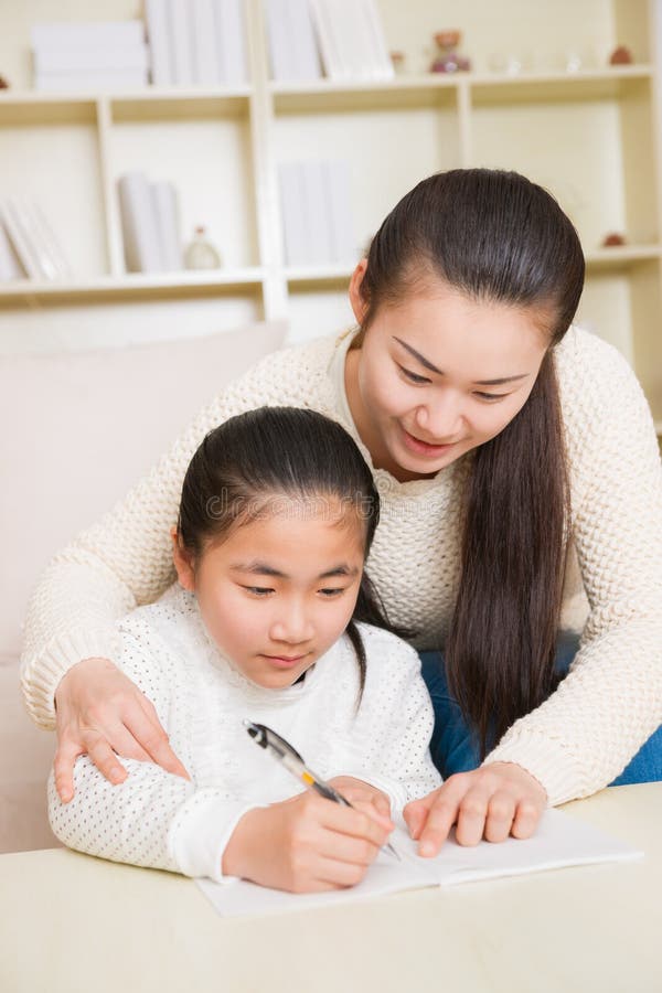 Helping homework stock image. Image of asian, happiness - 31178215