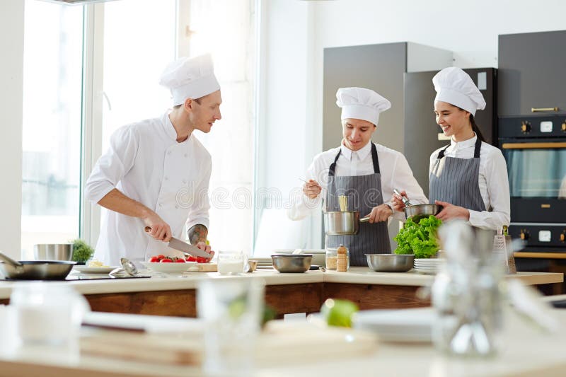 Helping in the kitchen stock image. Image of teamwork - 118629515