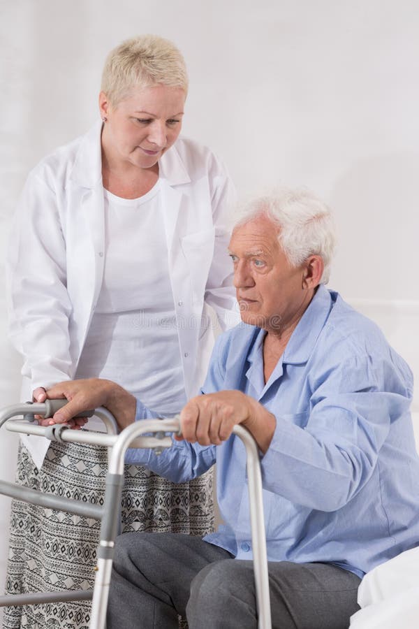 Helping man to get up stock photo. Image of emotion, care - 61032532