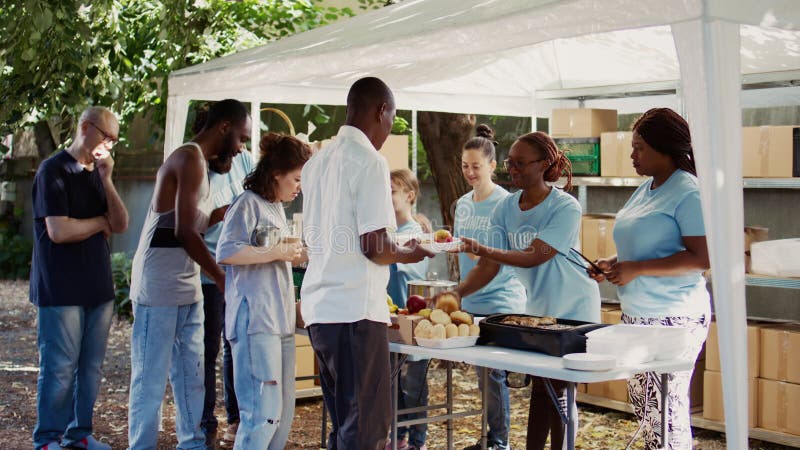 Helping the Needy: Unity in Diversity Stock Footage - Video of meal ...