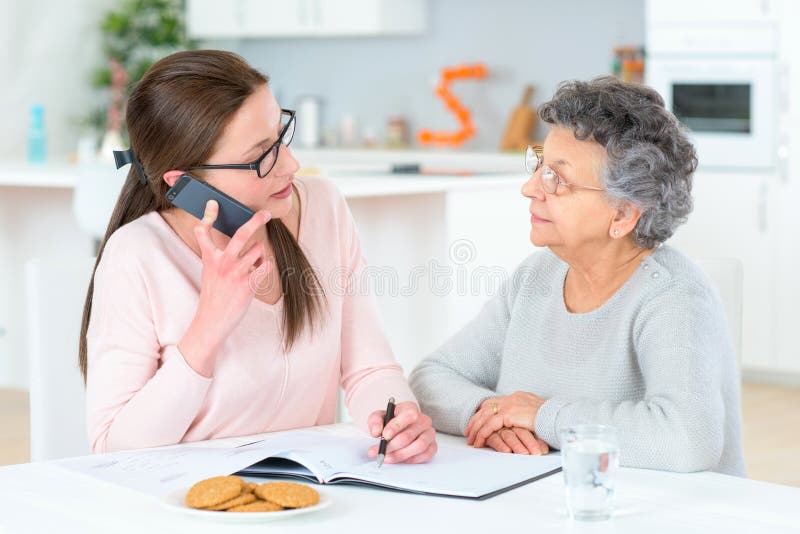 Helping Old Lady Sort Finances Stock Image - Image of experience, aged ...